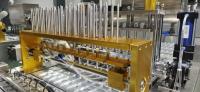 China Spoon Type Honey Packaging Machine 10-12 Head Automatic Honey Filling Machine for sale