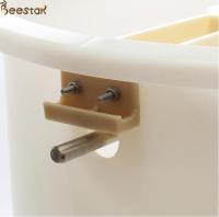 China 2 Frame Plastic Manual Honey Extractor for Beekeeping Honey Processing Machine with Honey Gate for sale
