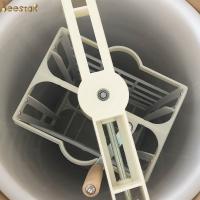 China 2 Frame Plastic Manual Honey Extractor for Beekeeping Honey Processing Machine with Honey Gate for sale