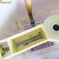 China 2 Frame Plastic Manual Honey Extractor for Beekeeping Honey Processing Machine with Honey Gate for sale