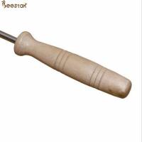 China Plastic Roller Uncapping Roller with Wooden Handle and Dense Needles for Propolis Collecting for sale
