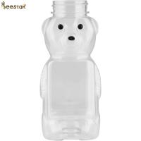 China Wholesale High Quality 300g Honey Jar And Spoon Plastic Empty Honey Bear Bottles for sale