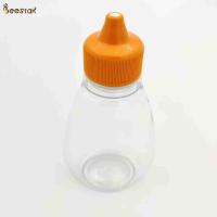 China 250ml 350ml 500ml Honey Jar And Spoon Plastic Empty Honey Bottles for honey storage for sale