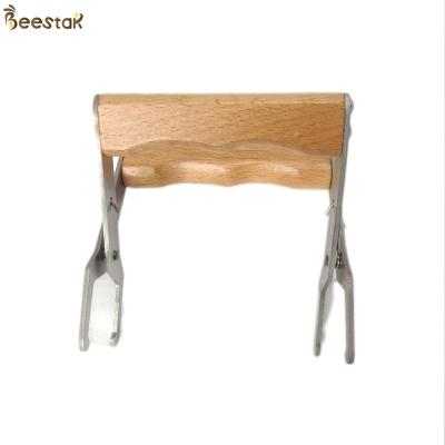 China Beekeeping Apiculture Tools Stainless Steel Bee Hive Frame Grip With Wooden Handle for sale