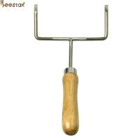 China Beekeeping Equipment Stainless Steel Foundation Sheet Fork With Wooden Handle for sale