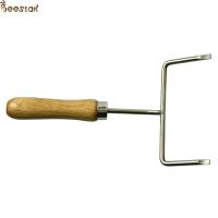 China Beekeeping Equipment Stainless Steel Foundation Sheet Fork With Wooden Handle for sale