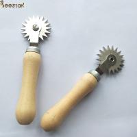 China Beekeeping Tool wooden handle Frame Manual Wheel Type Wire Embedder for beekeeping for sale
