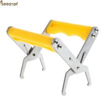 China Durable Apiculture Beehive Tools Yellow Beekeeping Frame Grip With Plastic Handle for sale