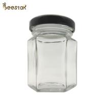 China 180ml 280ml 380ml 500ml 730ml Empty Bottles For Honey Transparent Honey Glass Jar for sale
