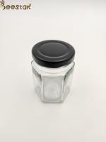 China 180ml 280ml 380ml 500ml 730ml Empty Bottles For Honey Transparent Honey Glass Jar for sale