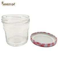 China 150ml 200ml 250ml 380ml Honey Jar And Spoon Wide Mouth With Thin Screw Metal Lid for sale