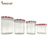 China 150ml 200ml 250ml 380ml Honey Jar And Spoon Wide Mouth With Thin Screw Metal Lid for sale