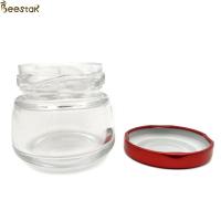China 50ml 75ml 120ml 150ml Honey Jar And Spoon Glass Honey Pot Jars for sale
