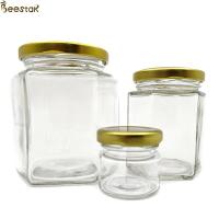 China 25ml glass honey jars bulk Empty Storage Glass Jar Glass Honey Bottles for sale