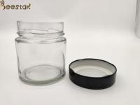 China 25ml 50ml Wide Mouth Glass Honey Jar Empty Honey Bottle for Honey and Jelly for sale