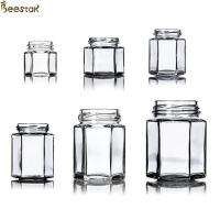China 35ml Muti Prismatic Bottle 45ml 65ml 85ml Clear Hexagon Glass Honey Jar for sale