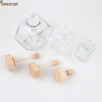 China 220ML Glass Jam Sauce Clear Honey Jar Hexagon Glass Honey Bottles for sale