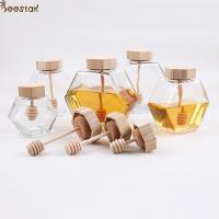 China 220ML Glass Jam Sauce Clear Honey Jar Hexagon Glass Honey Bottles for sale