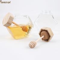 China 220ML Glass Jam Sauce Clear Honey Jar Hexagon Glass Honey Bottles for sale