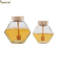 China 220ML Glass Jam Sauce Clear Honey Jar Hexagon Glass Honey Bottles for sale