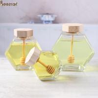 China 100ML Transparent Hexagon Honey Jars Jam Sauce Hex Honey Jars for sale