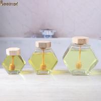 China 100ML Transparent Hexagon Honey Jars Jam Sauce Hex Honey Jars for sale