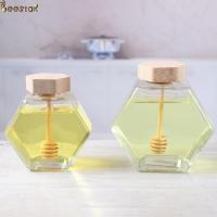China 100ML Transparent Hexagon Honey Jars Jam Sauce Hex Honey Jars for sale