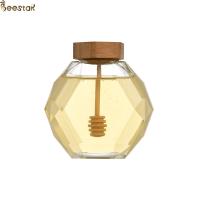 China 380ML Glass Honey Hexagon Jar With Wooden Cover And Wooden Splash Bar for sale