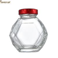 China 200ML 380ML Glass Hexagon Honey Bottle With Golden Silver Red Black Metal Lid for sale