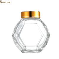 China 200ML 380ML Glass Hexagon Honey Bottle With Golden Silver Red Black Metal Lid for sale