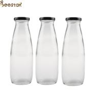 China 1L High Round Bottle Jam Sauce Honey Storage Jar Bottles for sale