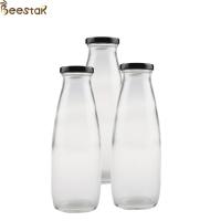 China 1L High Round Bottle Jam Sauce Honey Storage Jar Bottles for sale