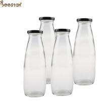 China 1L High Round Bottle Jam Sauce Honey Storage Jar Bottles for sale