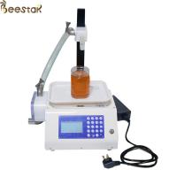 China SS 304 Anti-drip Spout Honey Filling Machine with 100-5000ml Filling Scope for Paste and Liquid for sale