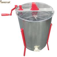 China Metal Stands SS Honey Extractor Manual Honey Processing Machine 4 Frames for sale
