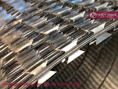 China BTO-16 Hot Dipped Galvanized Concertina Razor Wire Coil O.D. 1100mm, HeslyFence, China for sale