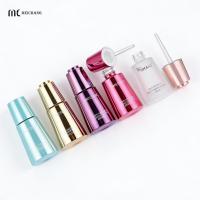 China 30ml Borosilicate Glass Dropper Bottle Rotating Unlock High-Seal Design for Skincare Serums for sale