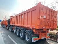 China Extra Capacity Quad Axle Dump Trailer for Bulk Transport Customization 16 Tire Number for sale