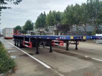 China Lowboy 20FT/40FT Container Carrier/Transport Semi-Trailer With Leaf Spring Suspension for sale