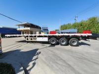 China 3 Axles 20FT 40FT Semi Truck Flatbed Trailer  Container Transportation 60-100 Tons for sale