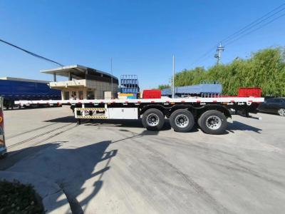 China 3 Axles 20FT 40FT Semi Truck Flatbed Trailer  Container Transportation 60-100 Tons for sale