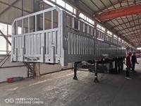 China 4 Axle 80 Ton Transport Trucks Bulk Goods Sidewall Fence Trailers Dropside Semi Trailer for sale
