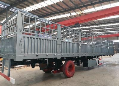 China 12/16 Tire 3 Axle Load 40-60 Ton Stake Truck Semi Trailer For Animal Cargo Transport for sale