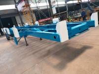 China Tri Axle Heavy Duty Flat Bed Cargo Semi Trailers Container Chassis Trailer Customizable for sale