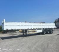 China 60t Load Capacity Steel Cargo Transport Semi-Trailer with Side Wall Drop Deck Design for sale