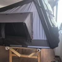 China Outdoor Waterproof SUV 4x4 Quick Setup Clamshell ABS Hard Shell Roof Top Tent 4 Person Rooftop Tent for 4x4 Off-Road Camping for sale
