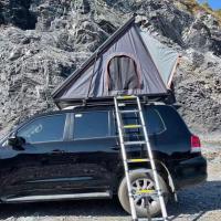 China Modern Novel Design Factory Price Car Roof Top Tent Hard Shell for sale