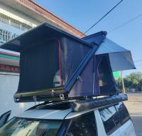 China Outdoor Camping in Stock Hot Sell Triangle Roof Top Tents Hard Shell Slim Aluminum Dachzelt Hardtop Car Rooftop Tent for sale