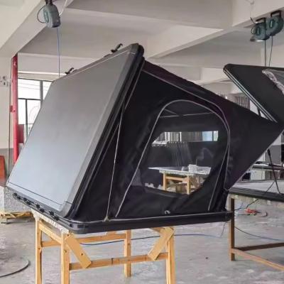 China Customized Campers Hard Aluminum Shell Rooftop Tent Outdoor Camping Folding Roof Top Tent 3 Person for sale