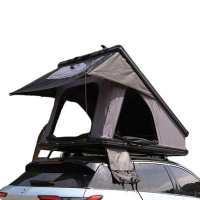 China Outdoor self driving camping roof tent with large black glue aluminum shell triangular roof tent inside for sale